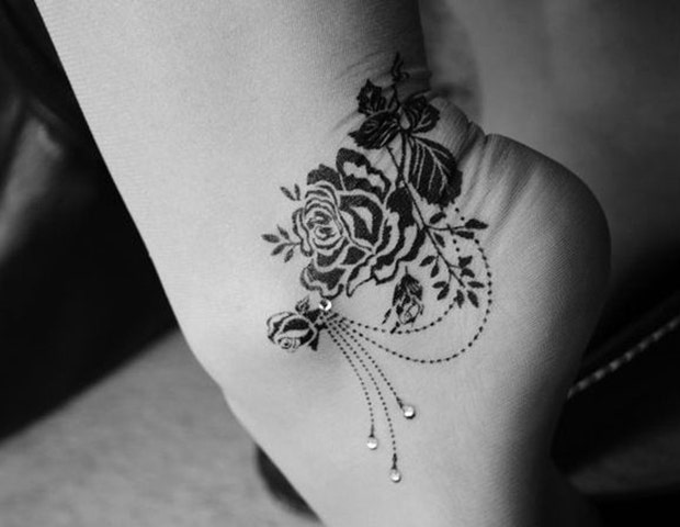 29 Tattoo Design Ideas With Dermal Piercings To Add Glam To Your Ink Yourtango